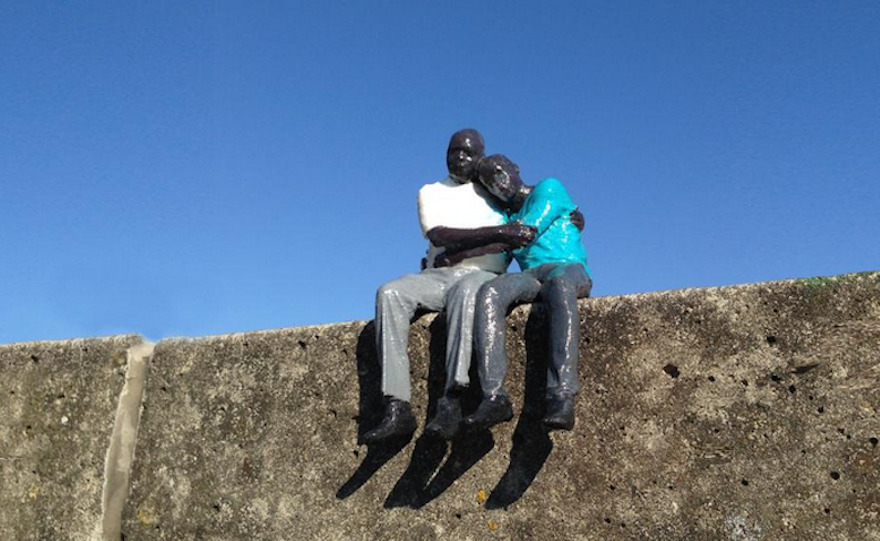 Miniature 3D-printed refugees in art project Moving People | Design Indaba