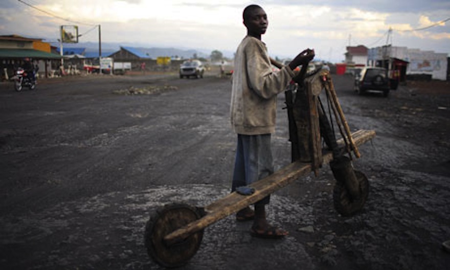This Congolese wooden bicycle-cum-scooter carries hundreds of kilograms ...
