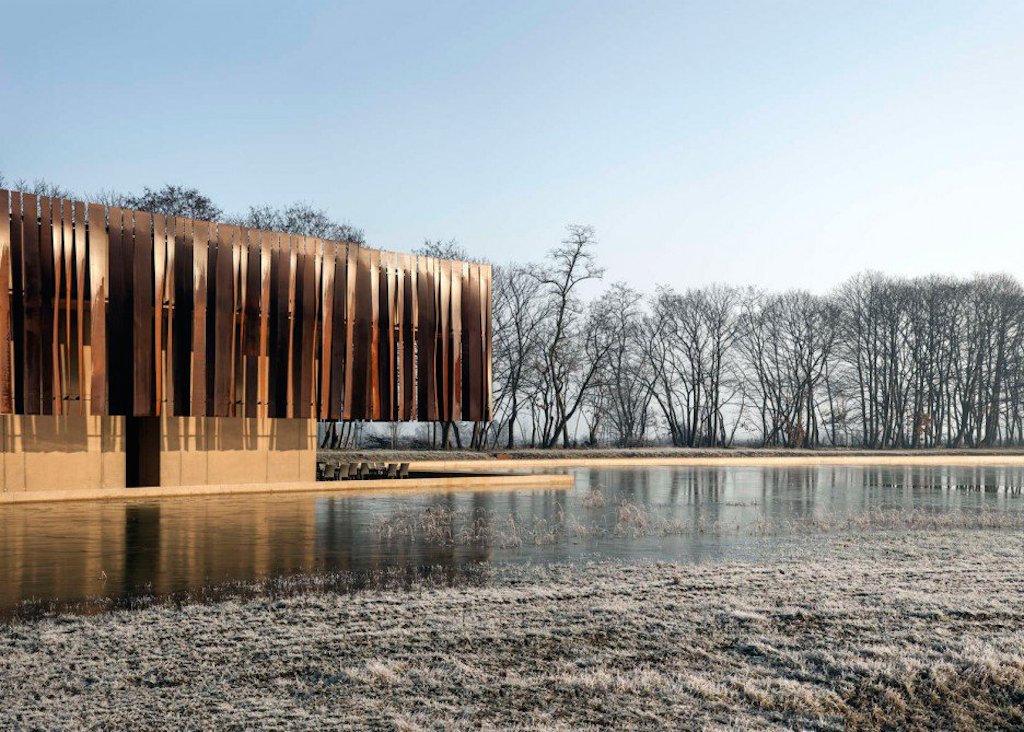Architects design a crematorium situated in the middle of a lake ...