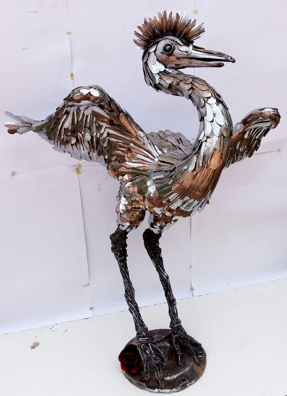 Nigerian sculptor makes life-sized art using spoons | Design Indaba